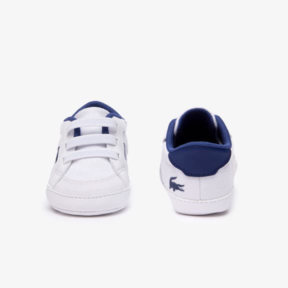Chaussures Lacoste L004 CRIB blanc pur bleu marine bebe